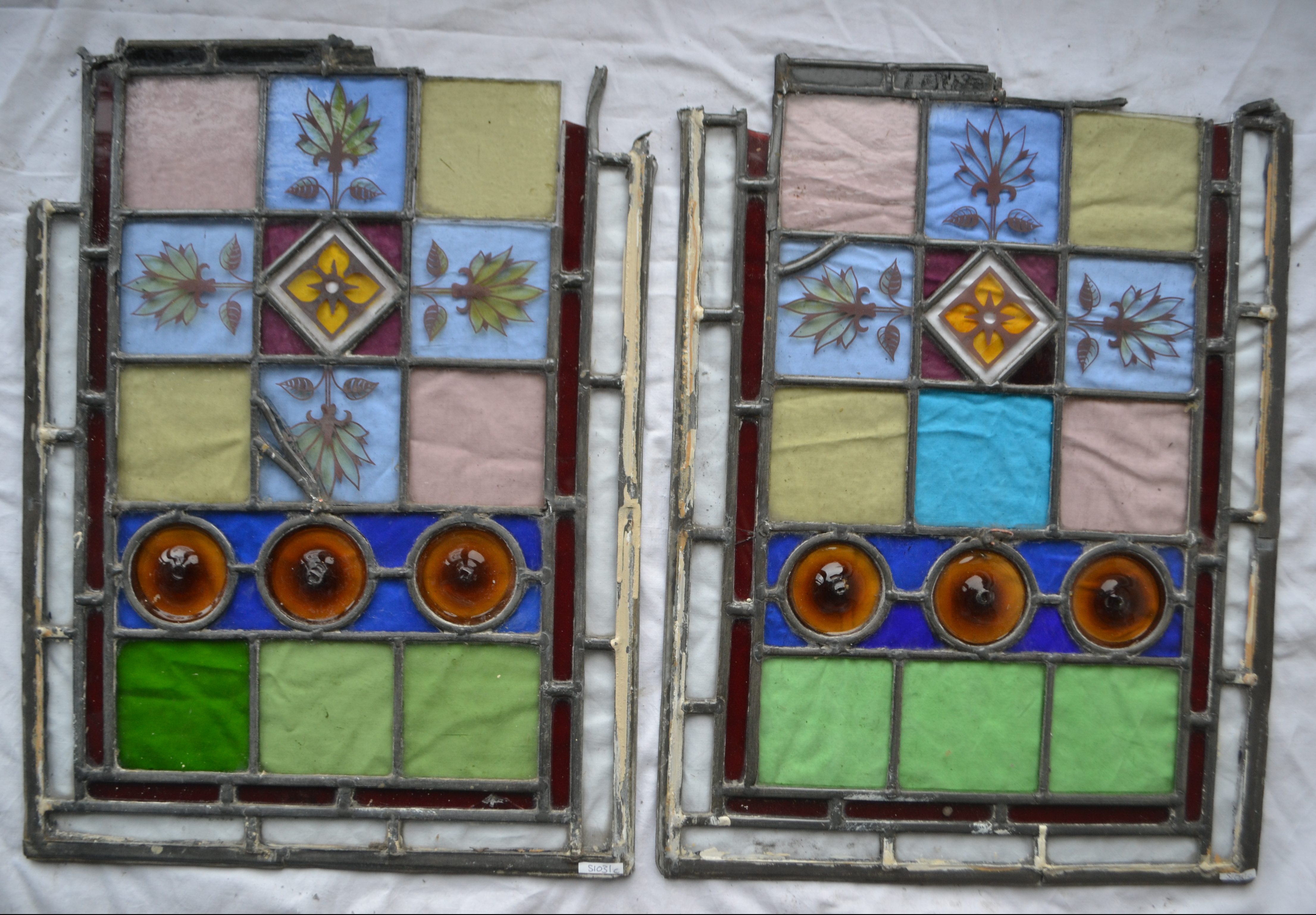 Images of reclaimed stained glass windows in their new homes